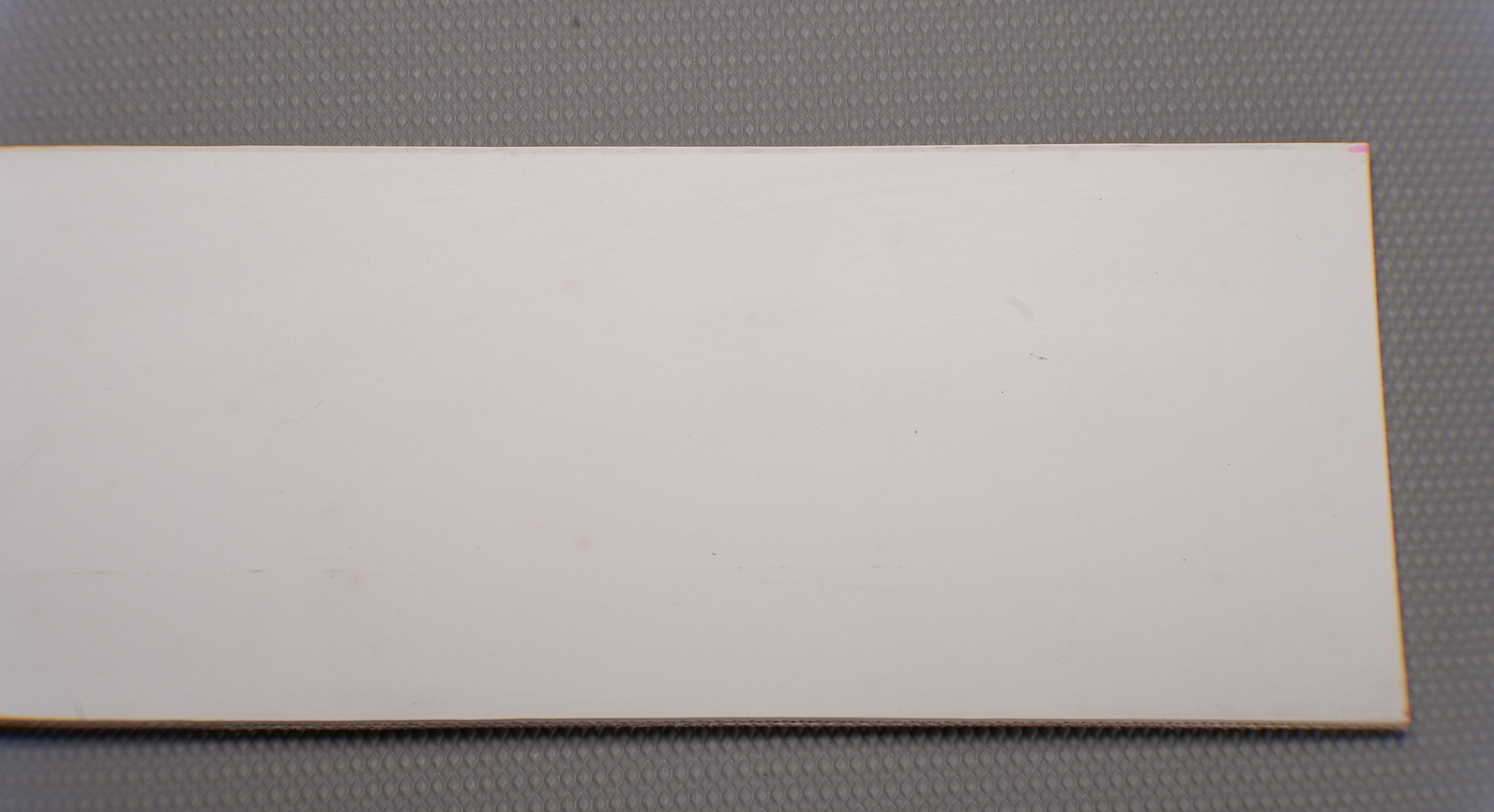 2PLY NITRILE 70 WHITE 3/64 X FS - Rubber Conveyor Belts — conveyor-belt.com